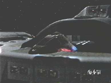 DELTA FLYER EXITING VOYAGER'S SHUTTLEBAY
